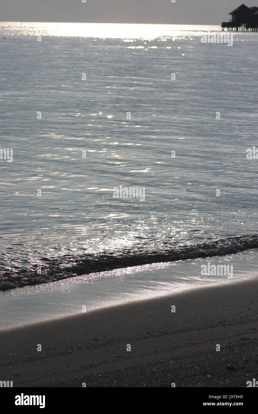 Shimmering beach maldives hi-res stock photography and images - Alamy