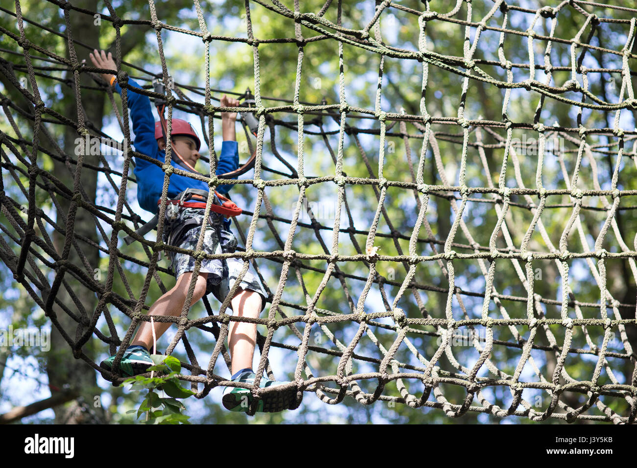 Children game in an adventure park Stock Photo - Alamy