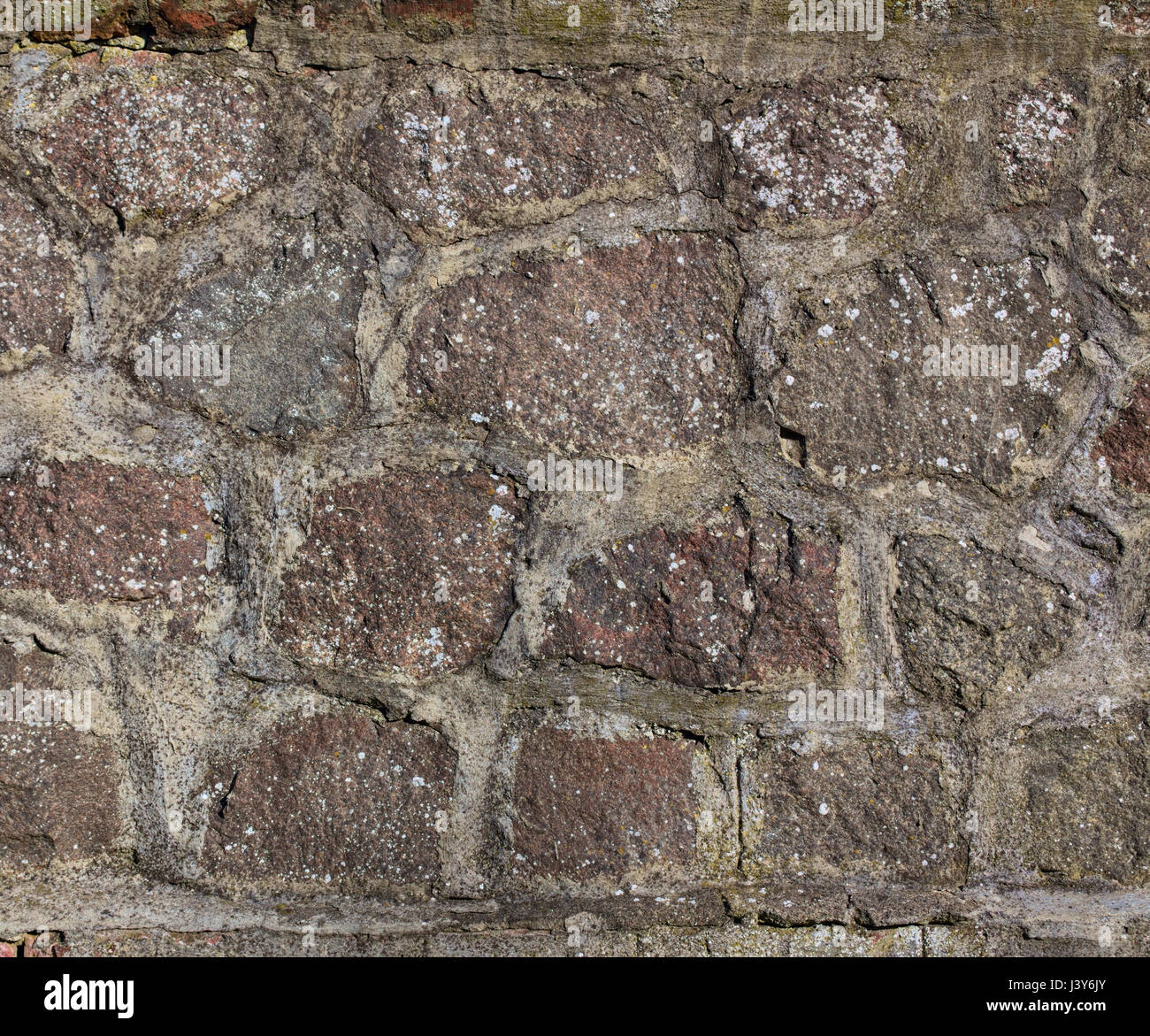 Texture of a wall with cobblestones and mortar Stock Photo - Alamy