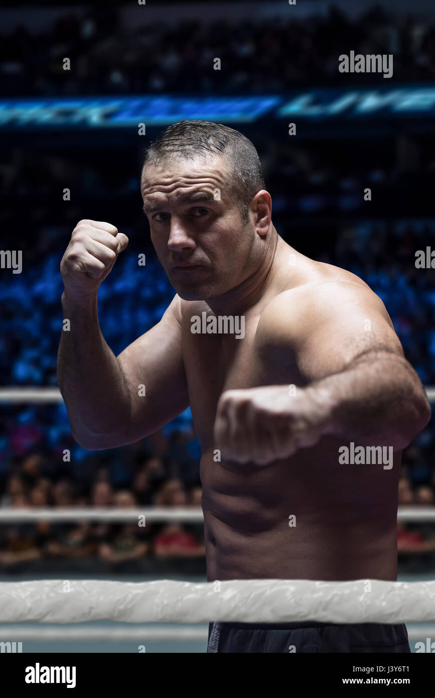 professional kickboxer with hands in martial arts position training for ...