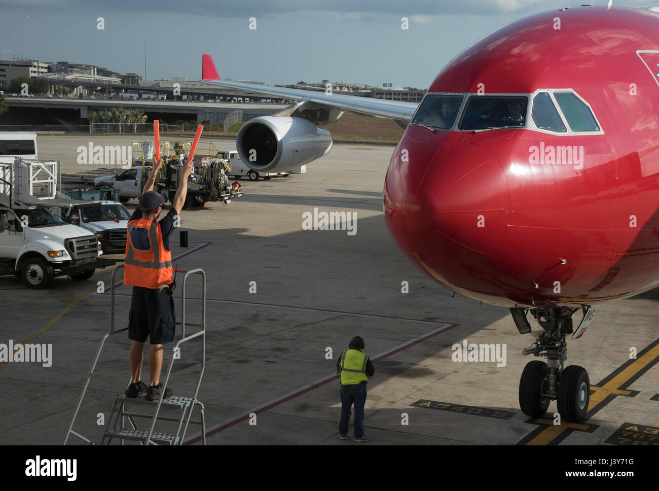 Man with signaling sticks High Resolution Stock Photography and Images ...