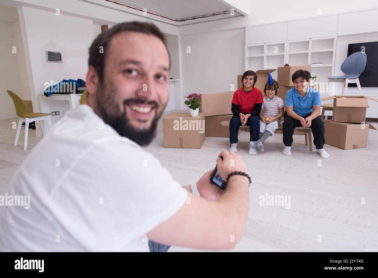 Photoshooting with kids models at studio as new modern home Stock Photo ...