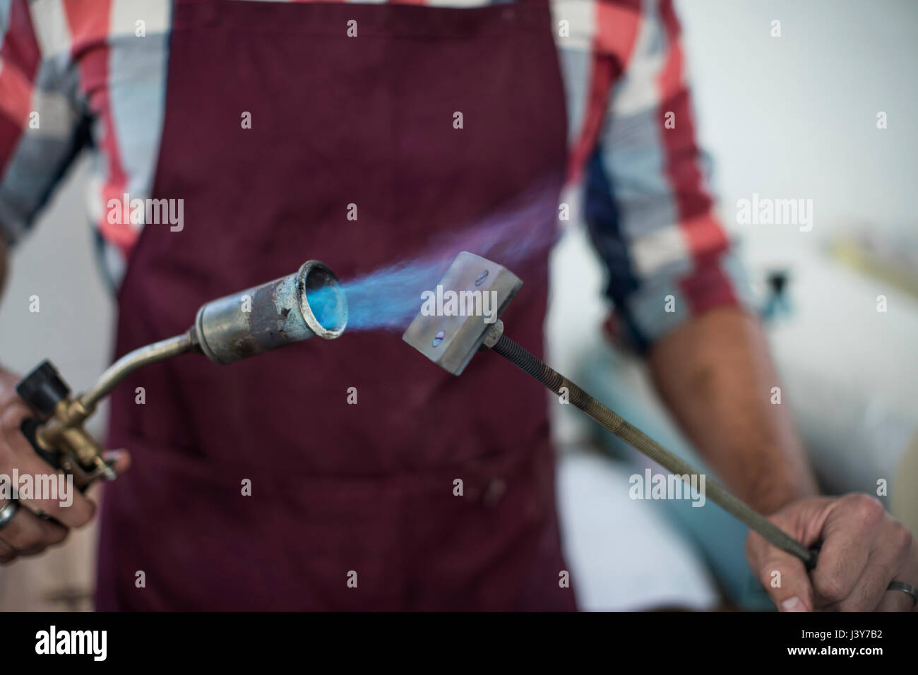 Branding iron hi-res stock photography and images - Alamy