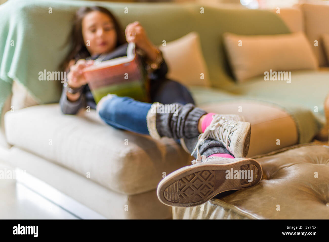 Legs up sofa hi-res stock photography and images - Alamy