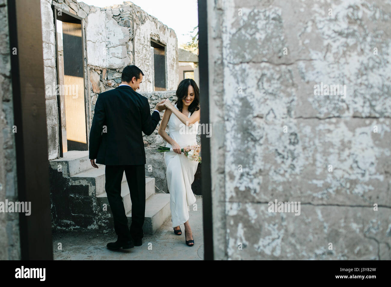 People following bride and groom hi-res stock photography and images ...