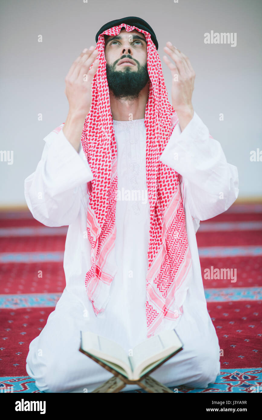 Muslim Arabic man praying Stock Photo - Alamy