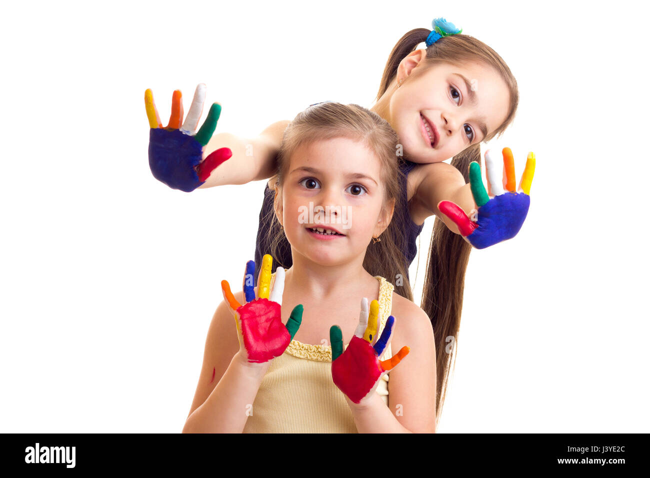 Little girls with colored hands Stock Photo - Alamy