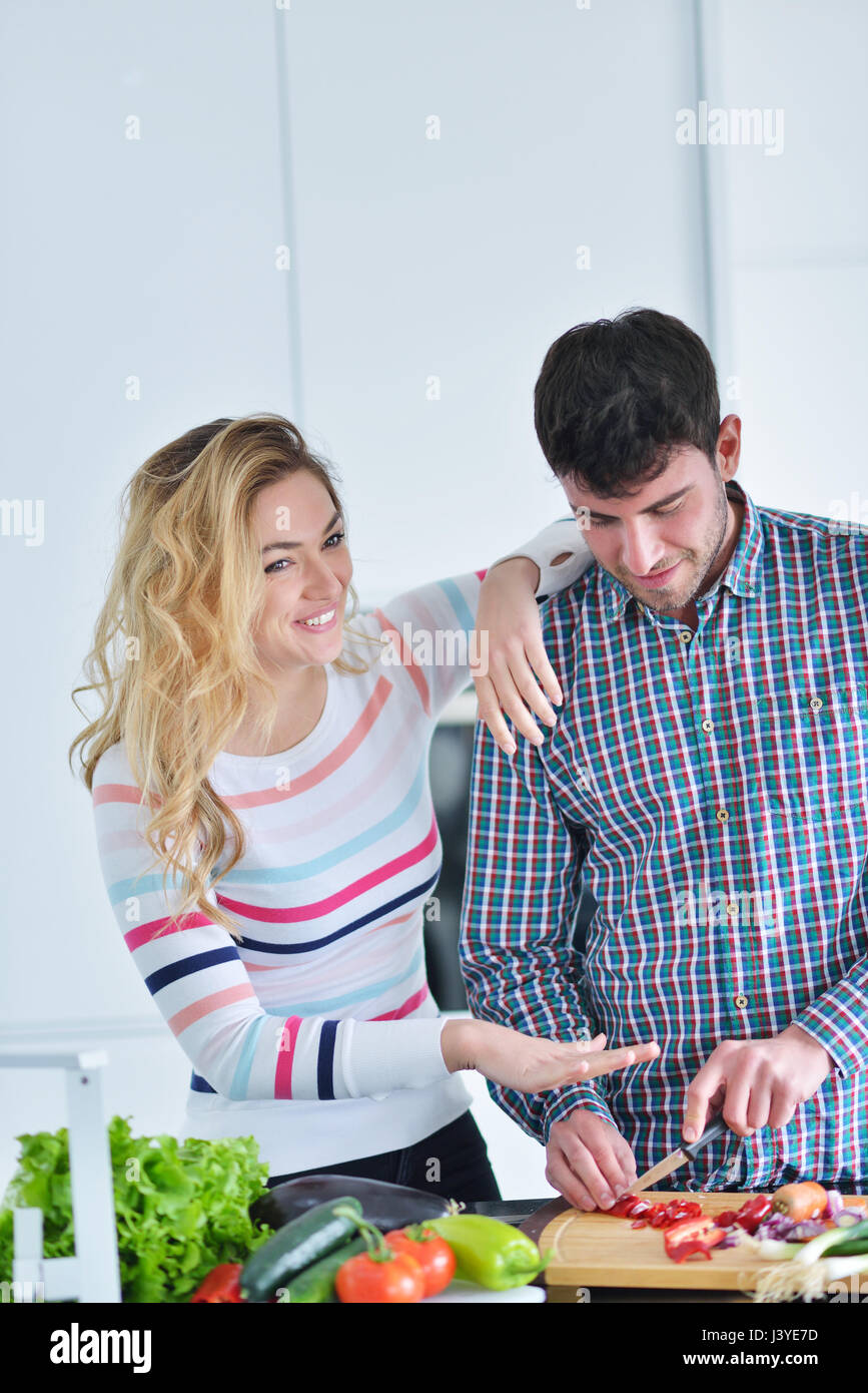 couple cooking healthy food in kitchen lifestyle meal preparation Stock ...