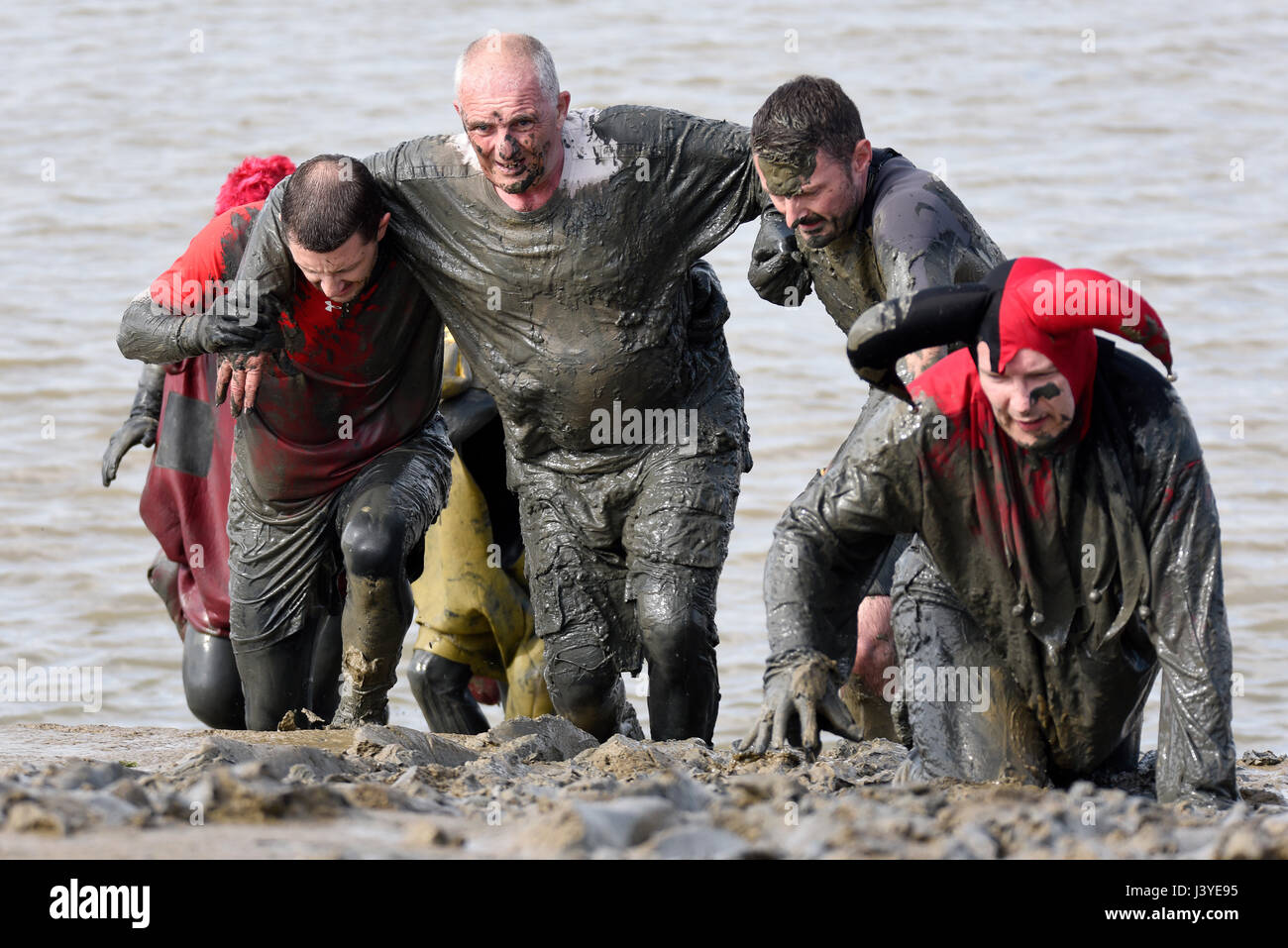 Mad Maldon Mud Race competitors covered in mud from racing through and ...