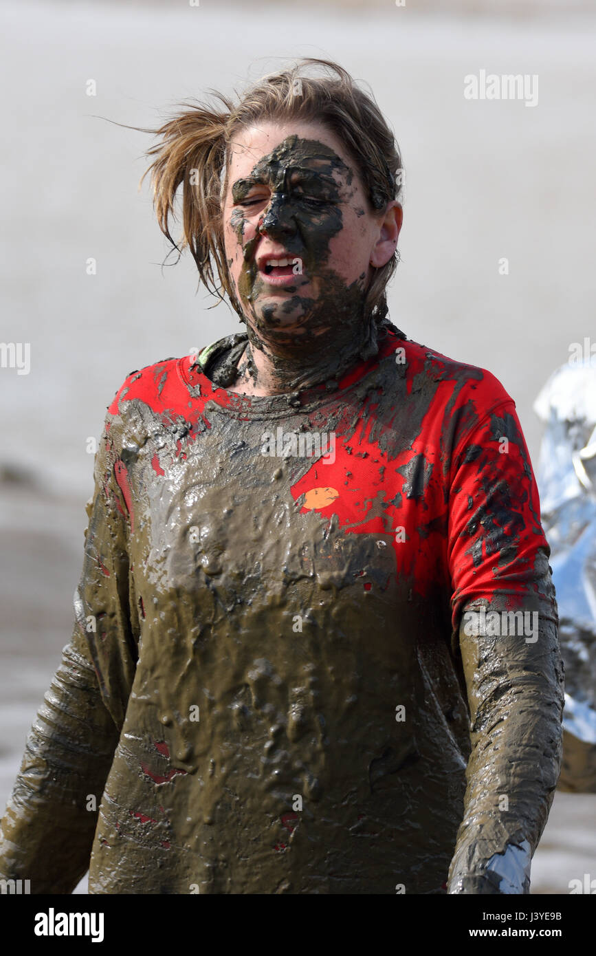 Mad Maldon Mud Race competitor covered in mud from racing through and ...