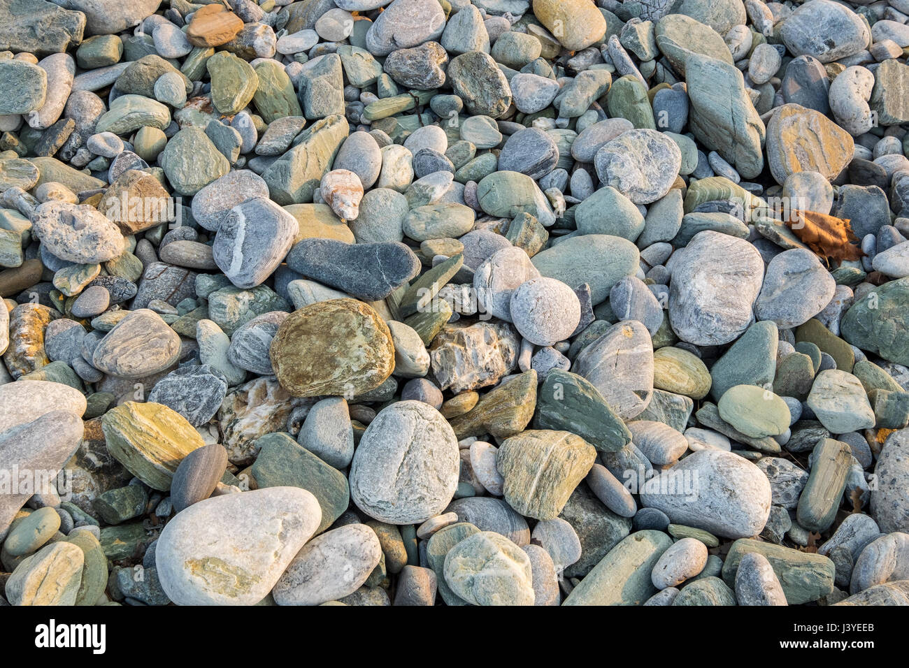 Colourful pebble on a stone beach. Greece Stock Photo - Alamy