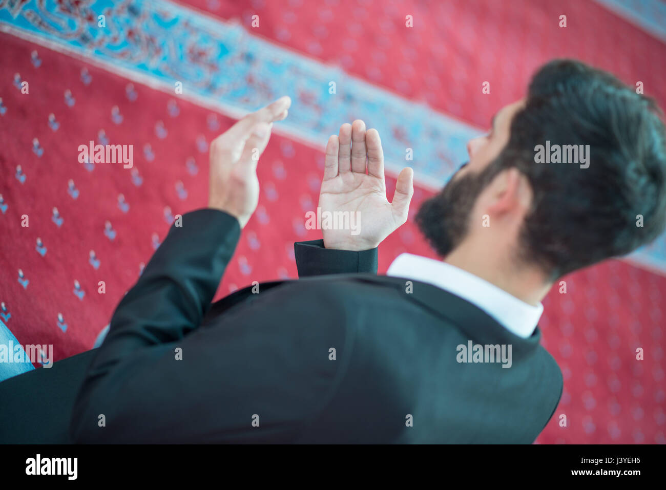 Muslim Arabic man praying Stock Photo - Alamy