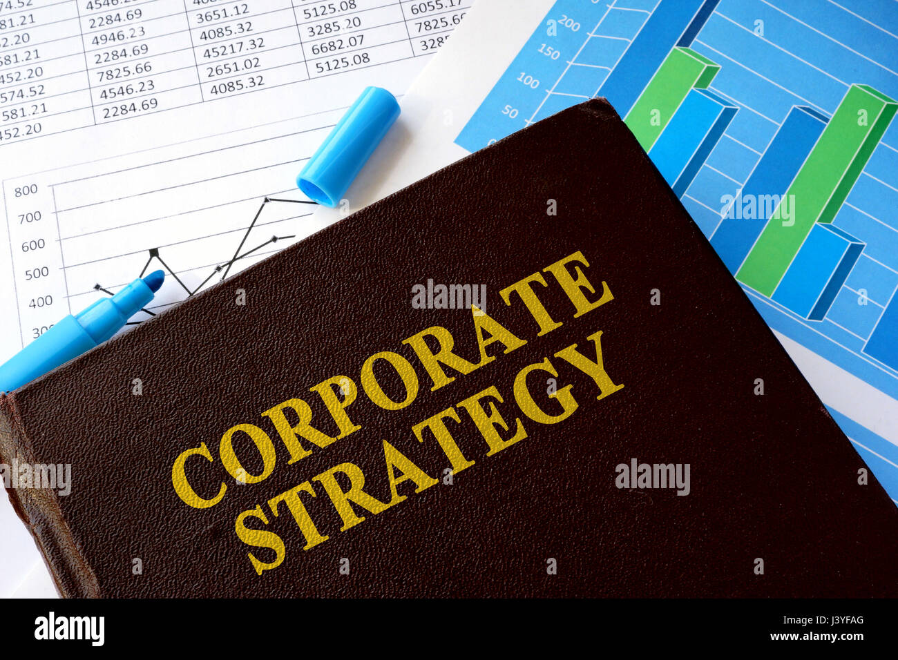 Book with title corporate strategy and financial data Stock Photo - Alamy