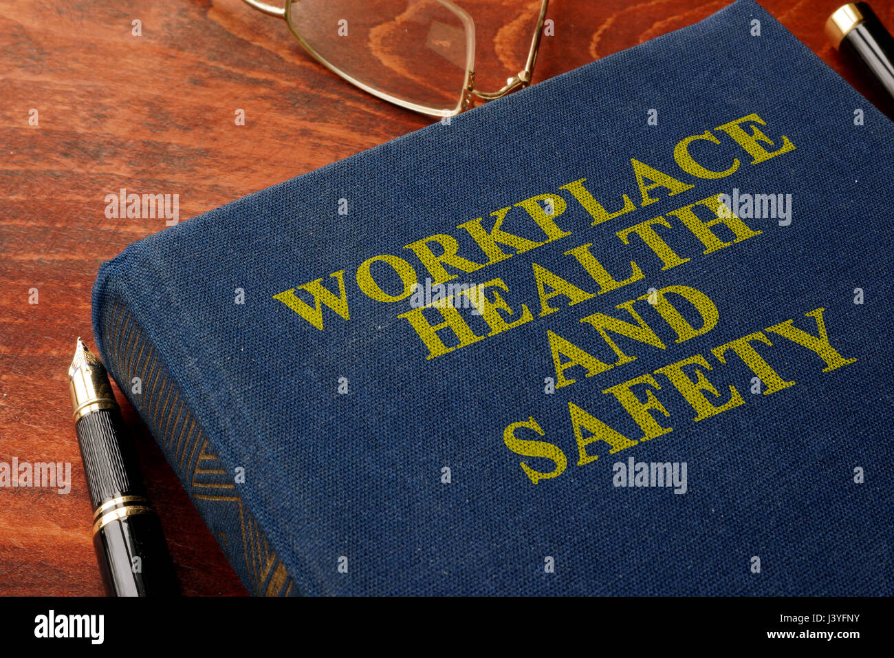 Title Workplace health and safety WHS on the book Stock Photo - Alamy