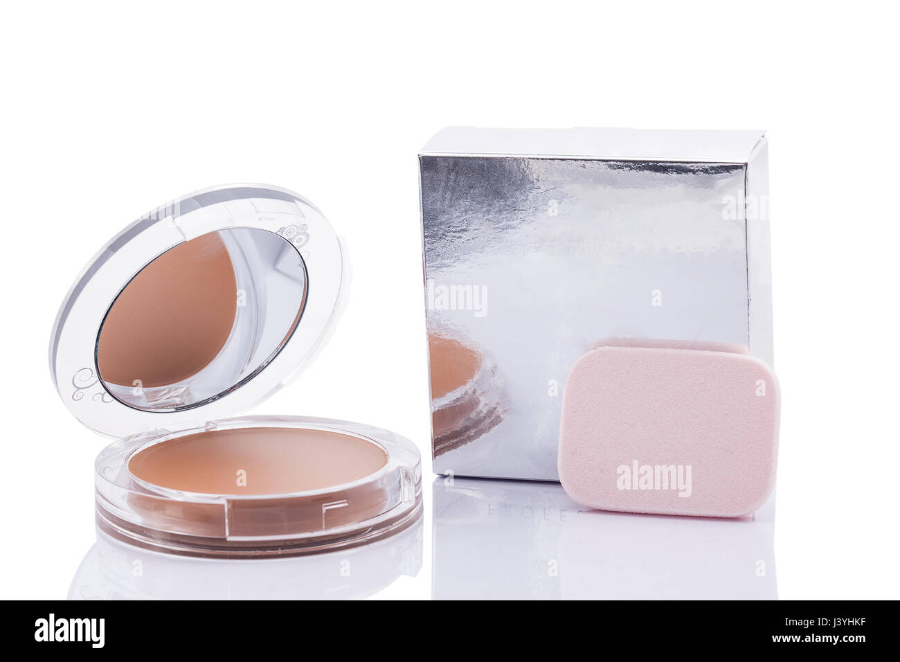 Cosmetic products isolated over white background in studio photo ...