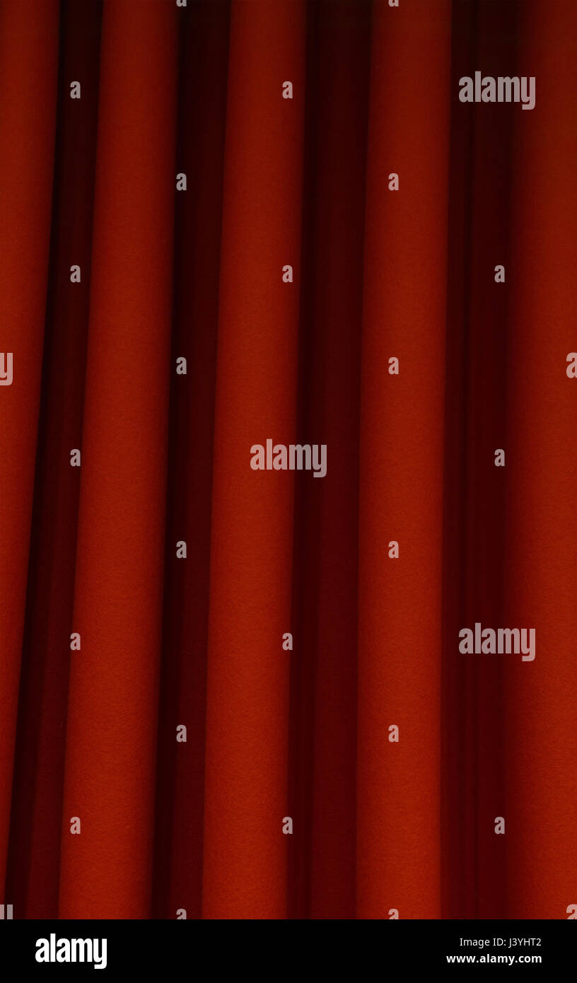 Heavy dark red pleated textile felt curtain background with portiere ...