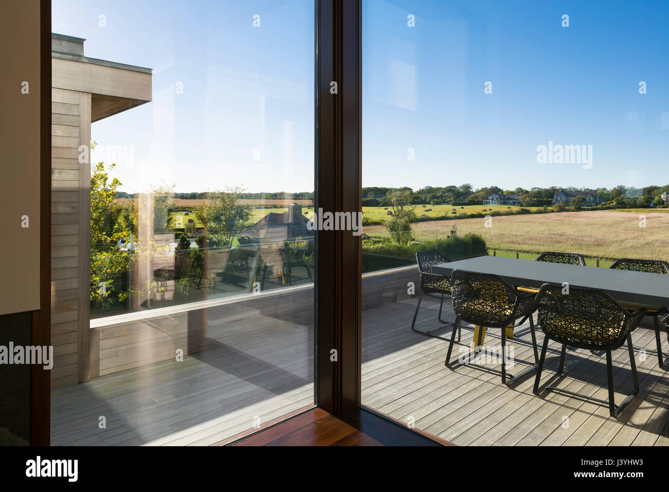 View through the living room window onto the north deck and the ...