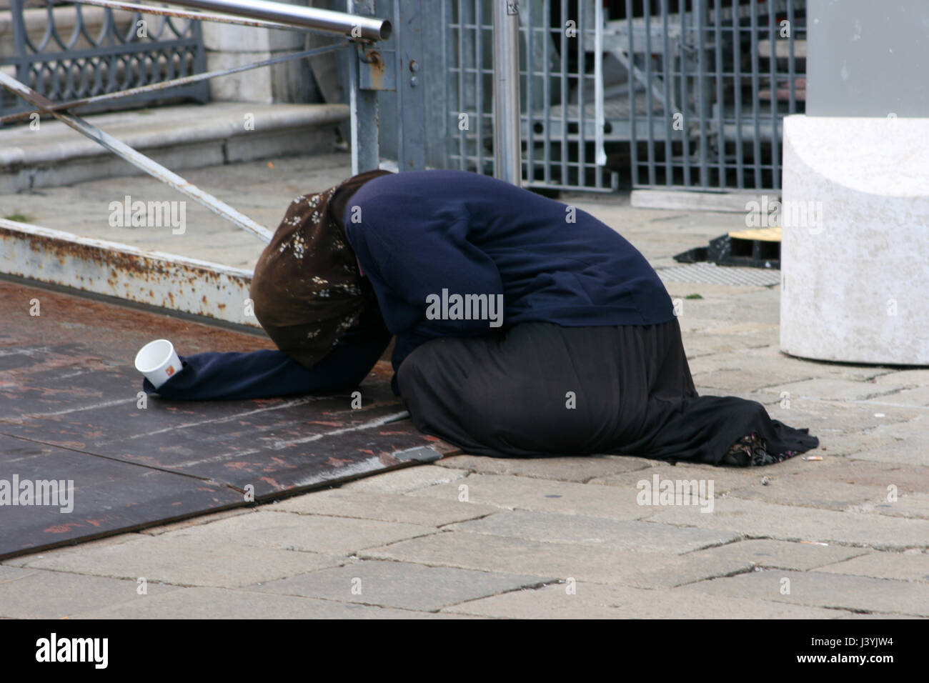 Homeless gypsy woman begging money hi-res stock photography and images ...