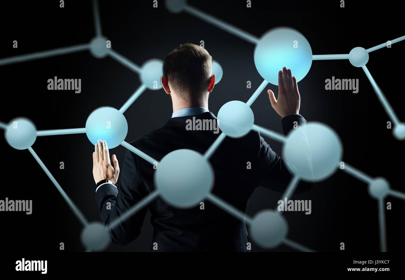 businessman touching virtual screen Stock Photo - Alamy