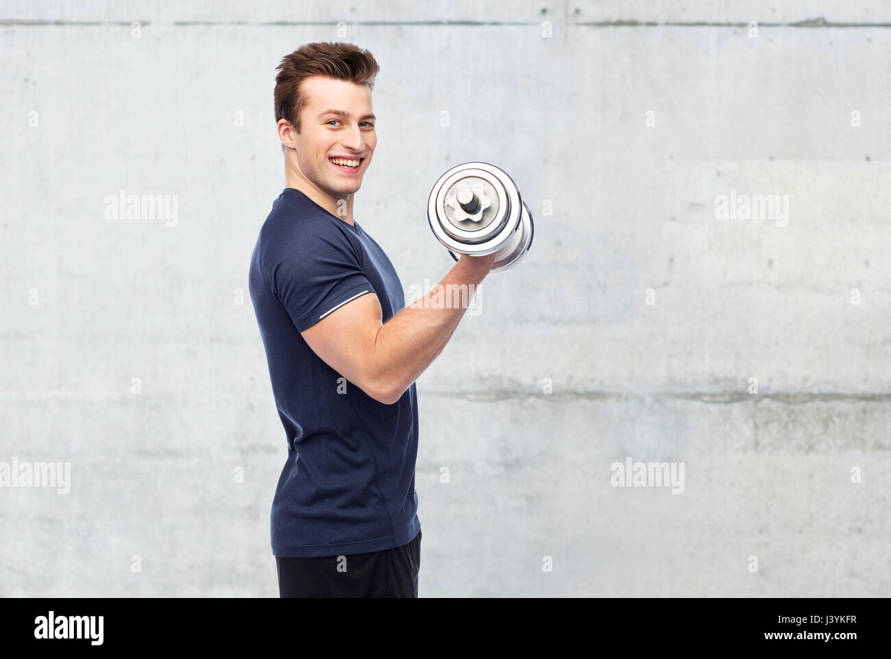 Sportive young man lifting hi-res stock photography and images - Alamy