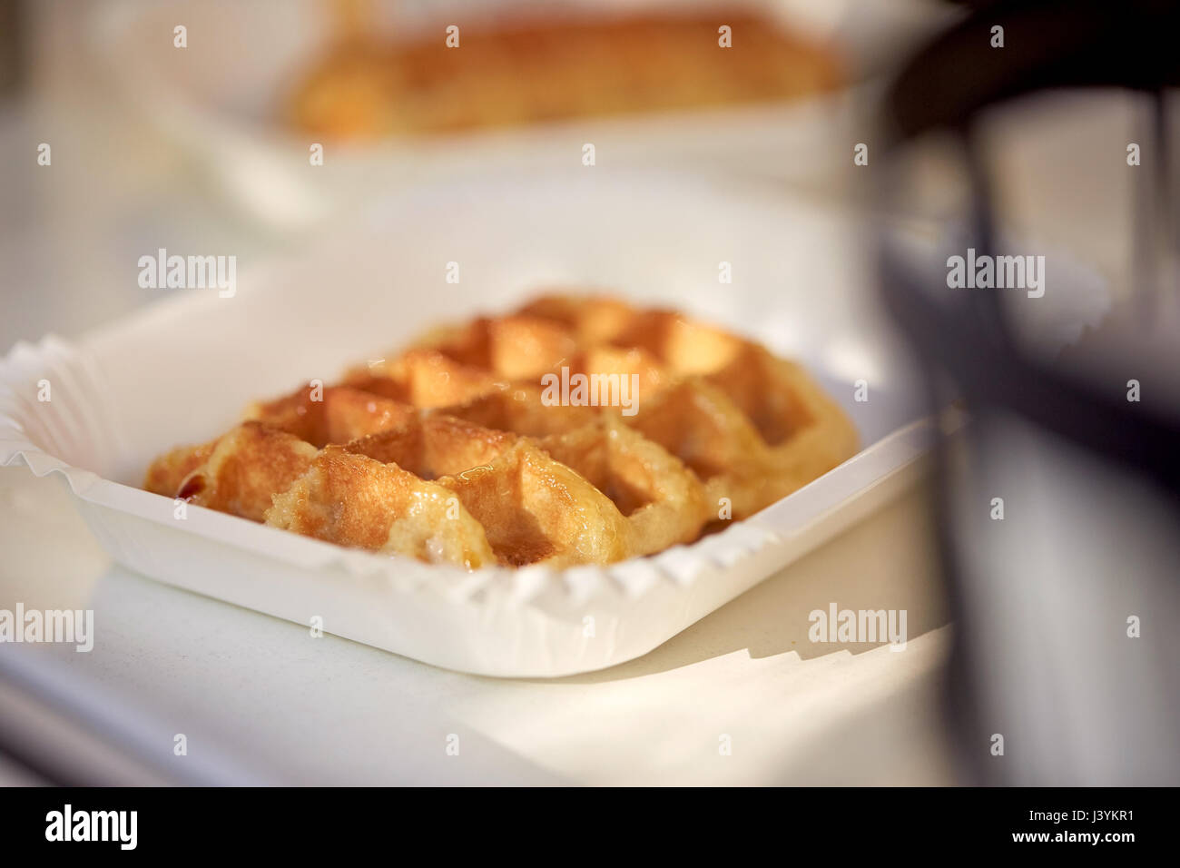 close up of waffle on paper plate Stock Photo - Alamy