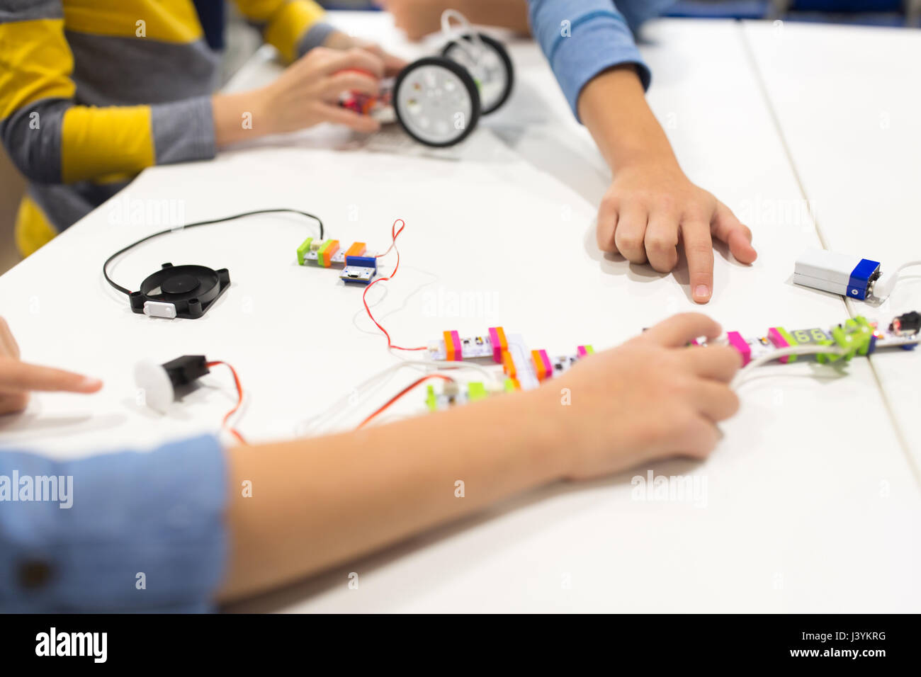children with building kit at robotics school Stock Photo - Alamy