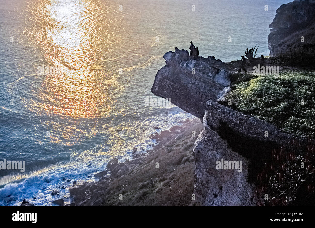Cliff view of sunset over Nazare beach in Portugal Stock Photo - Alamy