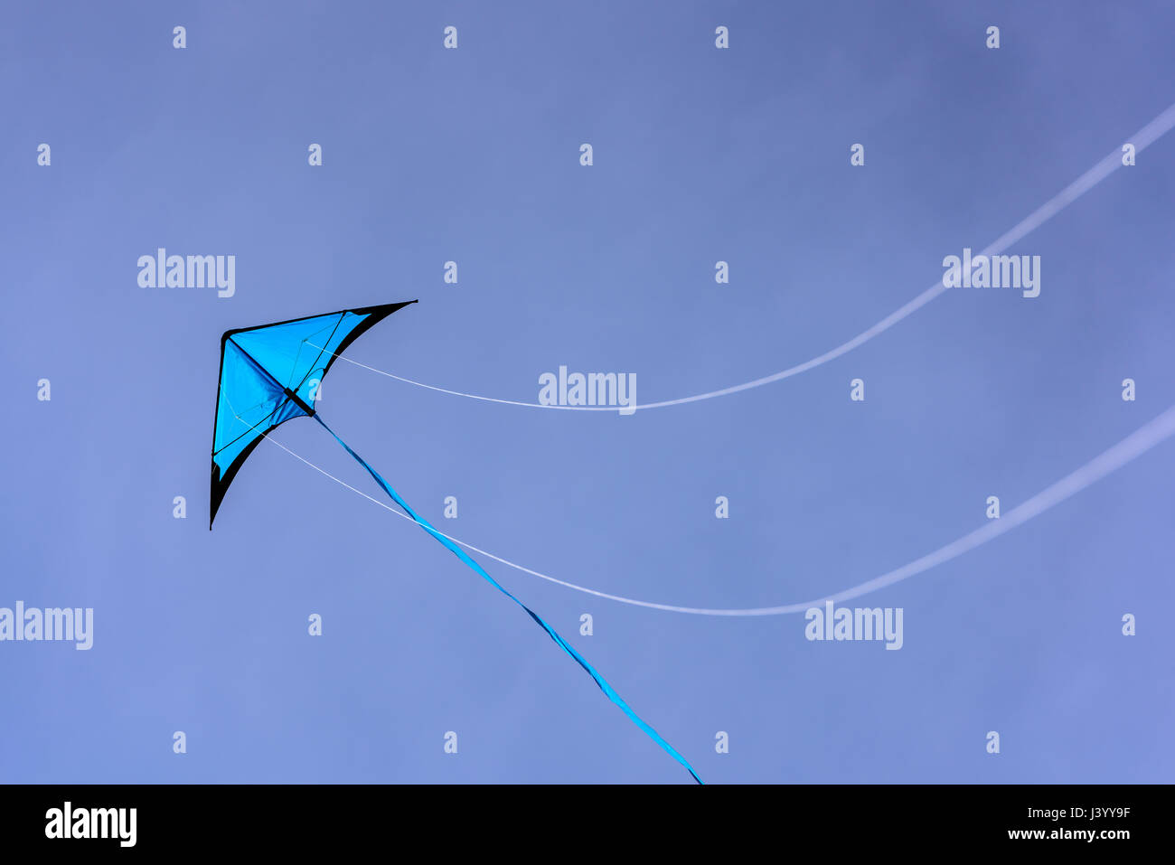 Blue kite floating in the blue sky. Kite with blue sky background Stock ...
