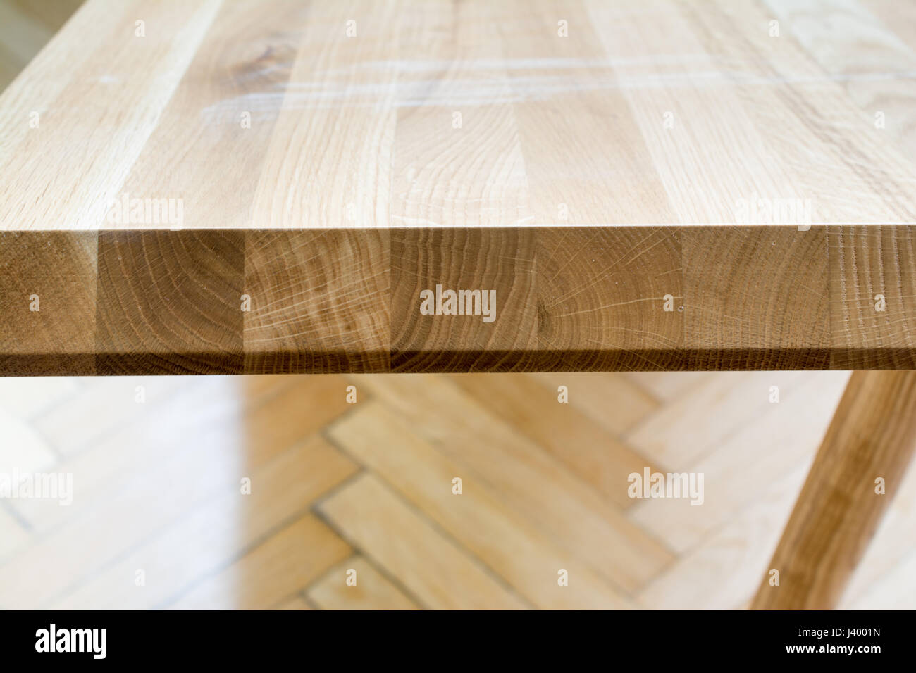 Wooden table top edge made of oak wood Stock Photo - Alamy