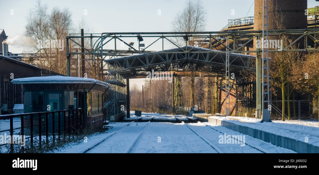 Industrial plant in winter snow ice steel Stock Photo - Alamy