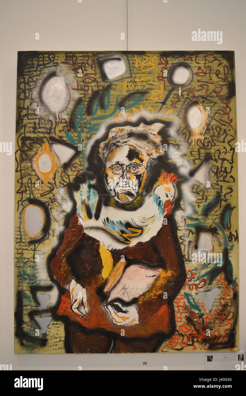 An Aziz Nesin painting is seen at an exhibition on May 8, 2017 in ...