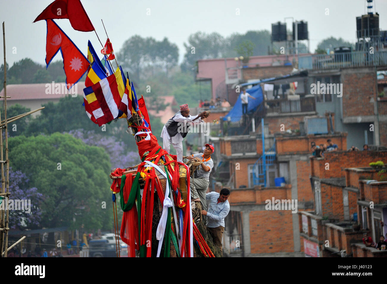 As a ceremony of Rato Machindranath Festival, coconut thrown from top ...
