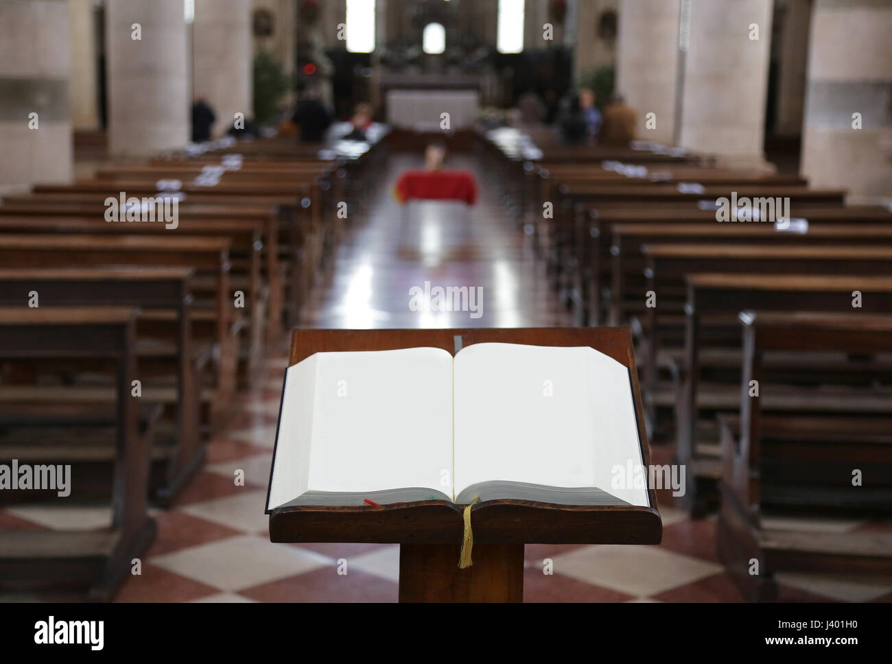 inside a church with a holy bible Stock Photo - Alamy