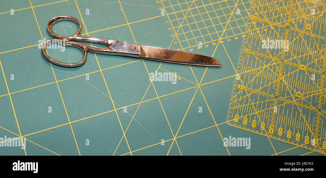 scissors and work plan in a tailoring workshop of a craftsman fashion ...