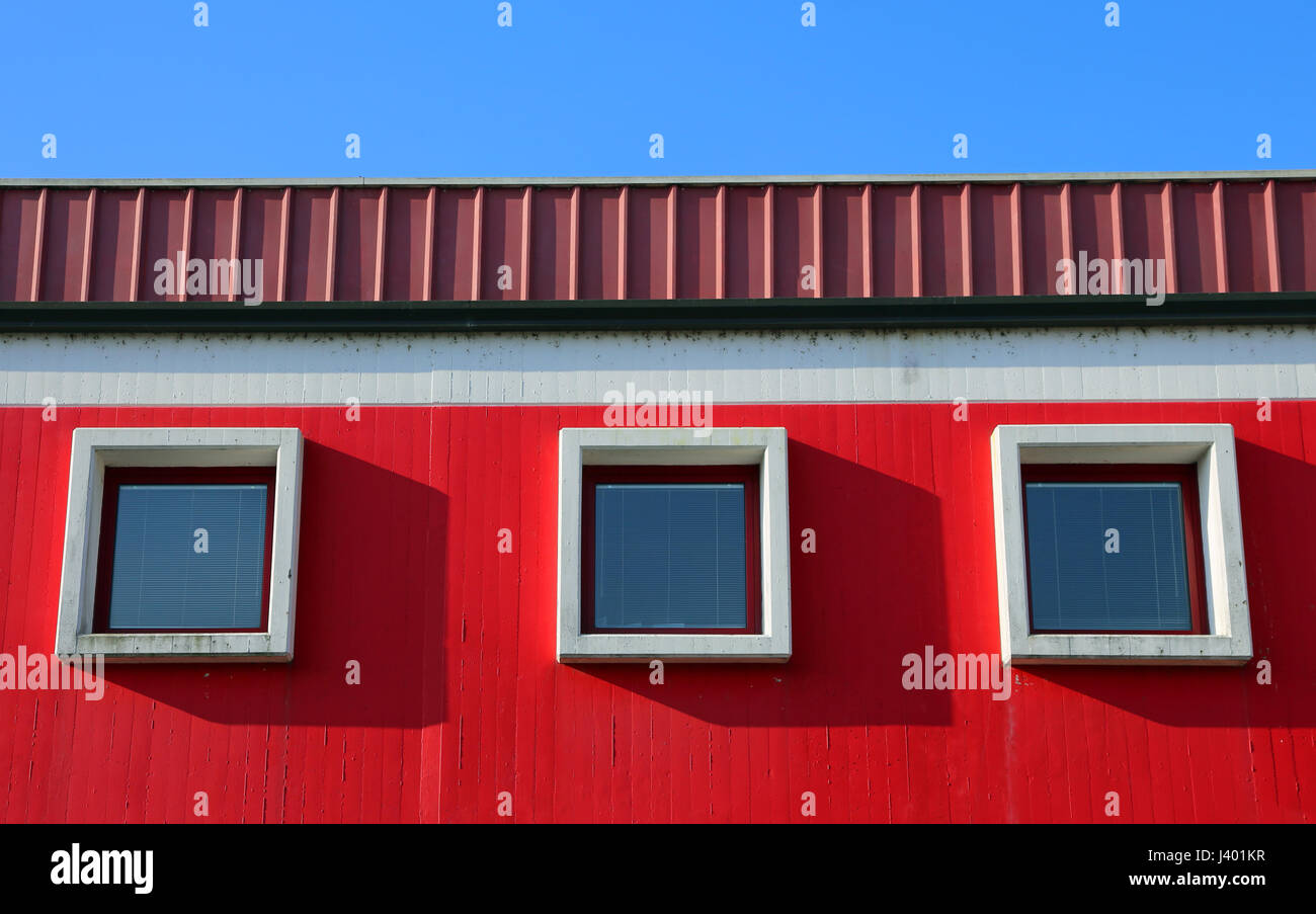 three square windows in the modern building and blue sky Stock Photo ...