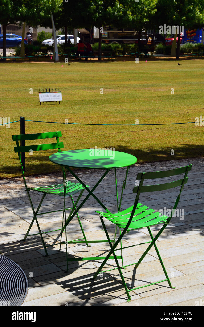Public tables and chairs line the walkways and tree lined paths around ...