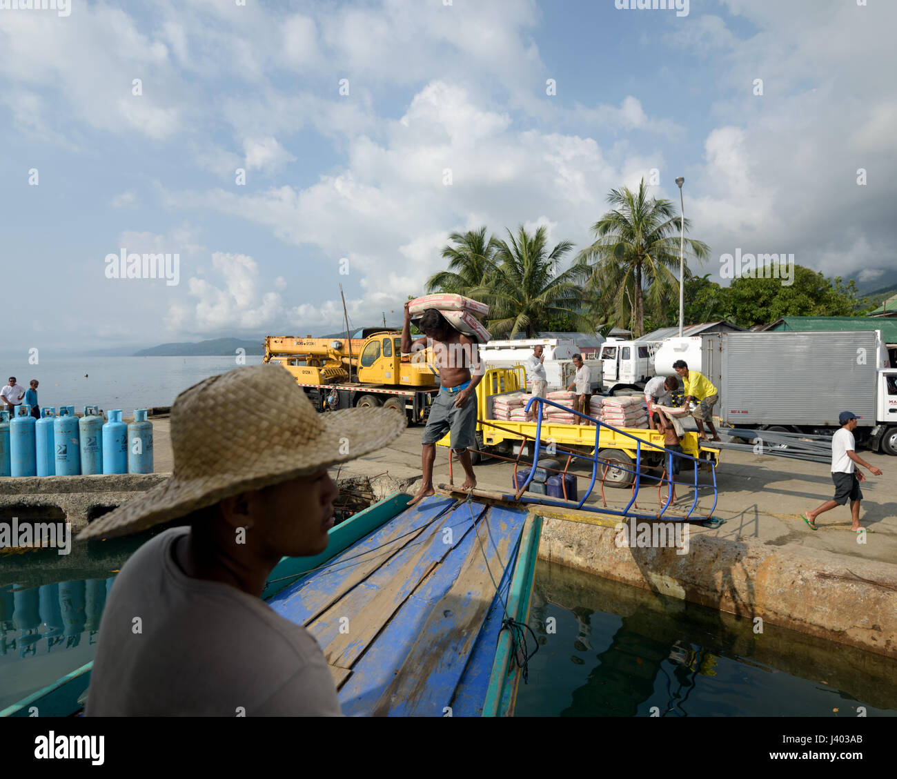 Polillo Island, Philippines - April 28, 2017: Filipino dockworkers ...