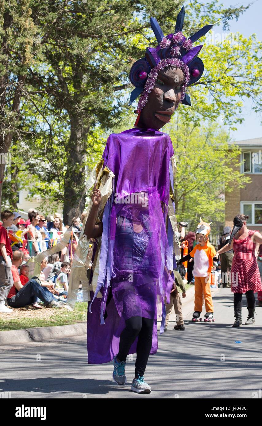 A giant puppet of an African woman, at the Mayday parade in Minneapolis ...