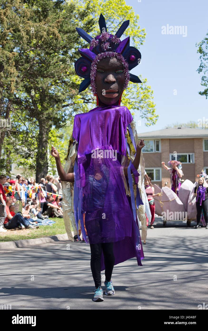 A giant puppet of an African woman, at the Mayday parade in Minneapolis ...