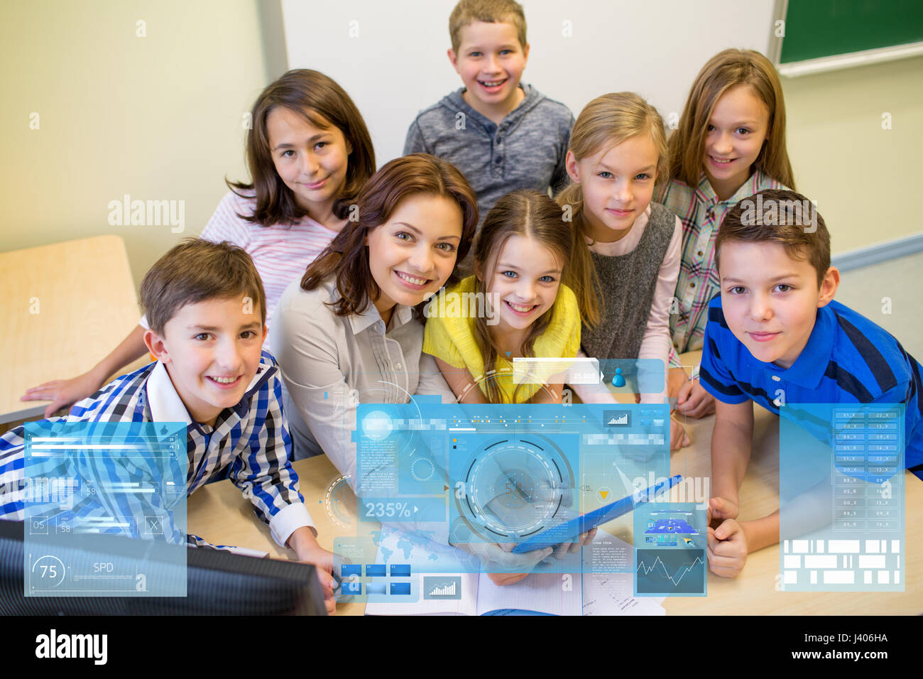 group of kids with teacher and tablet pc at school Stock Photo - Alamy