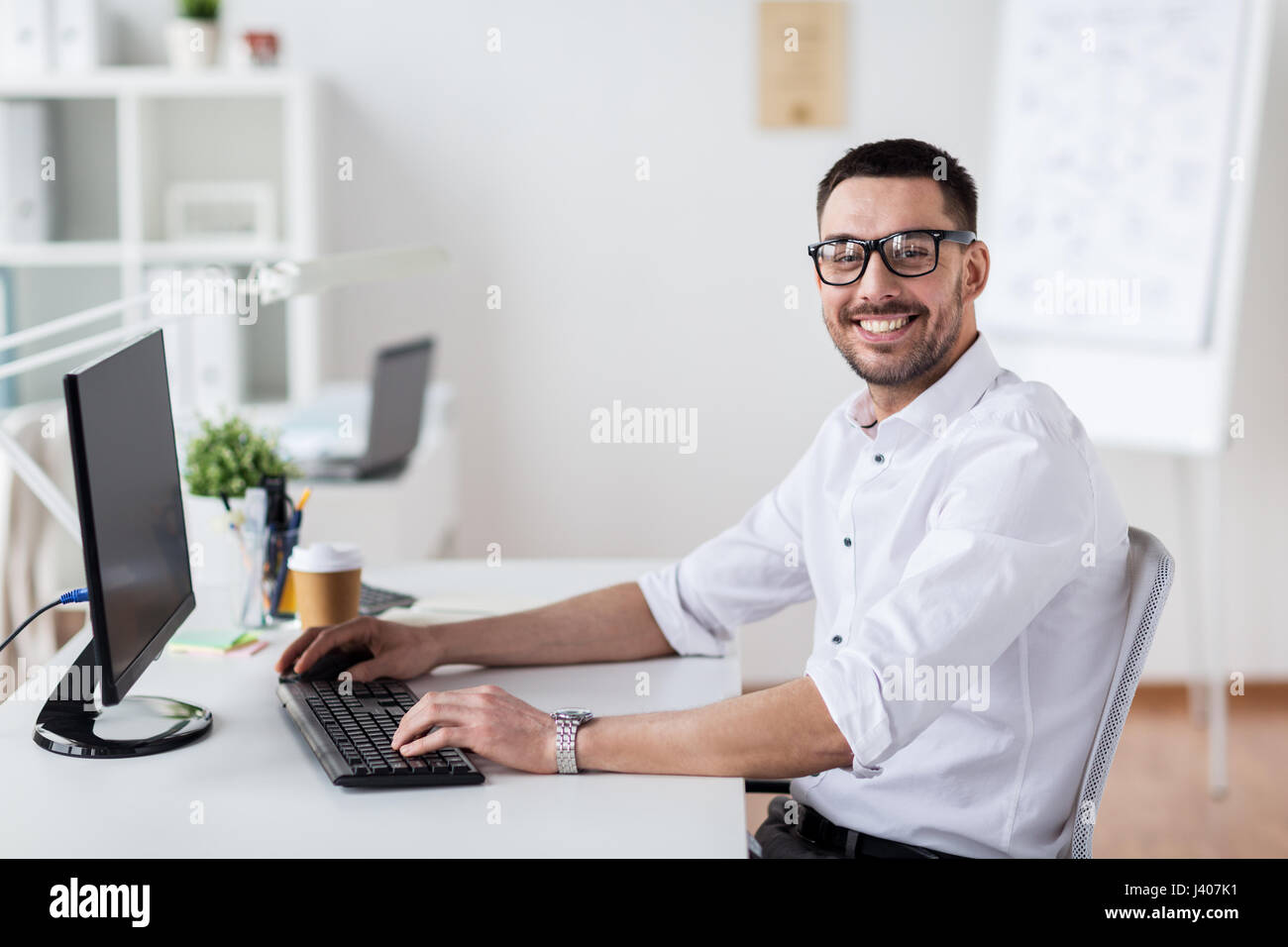 businessman typing on computer keyboard at office Stock Photo - Alamy