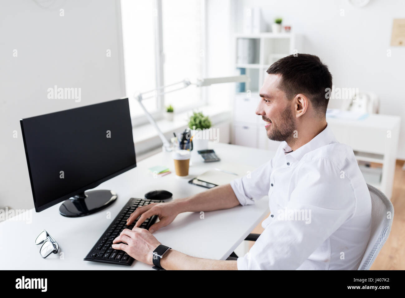 businessman typing on computer keyboard at office Stock Photo - Alamy