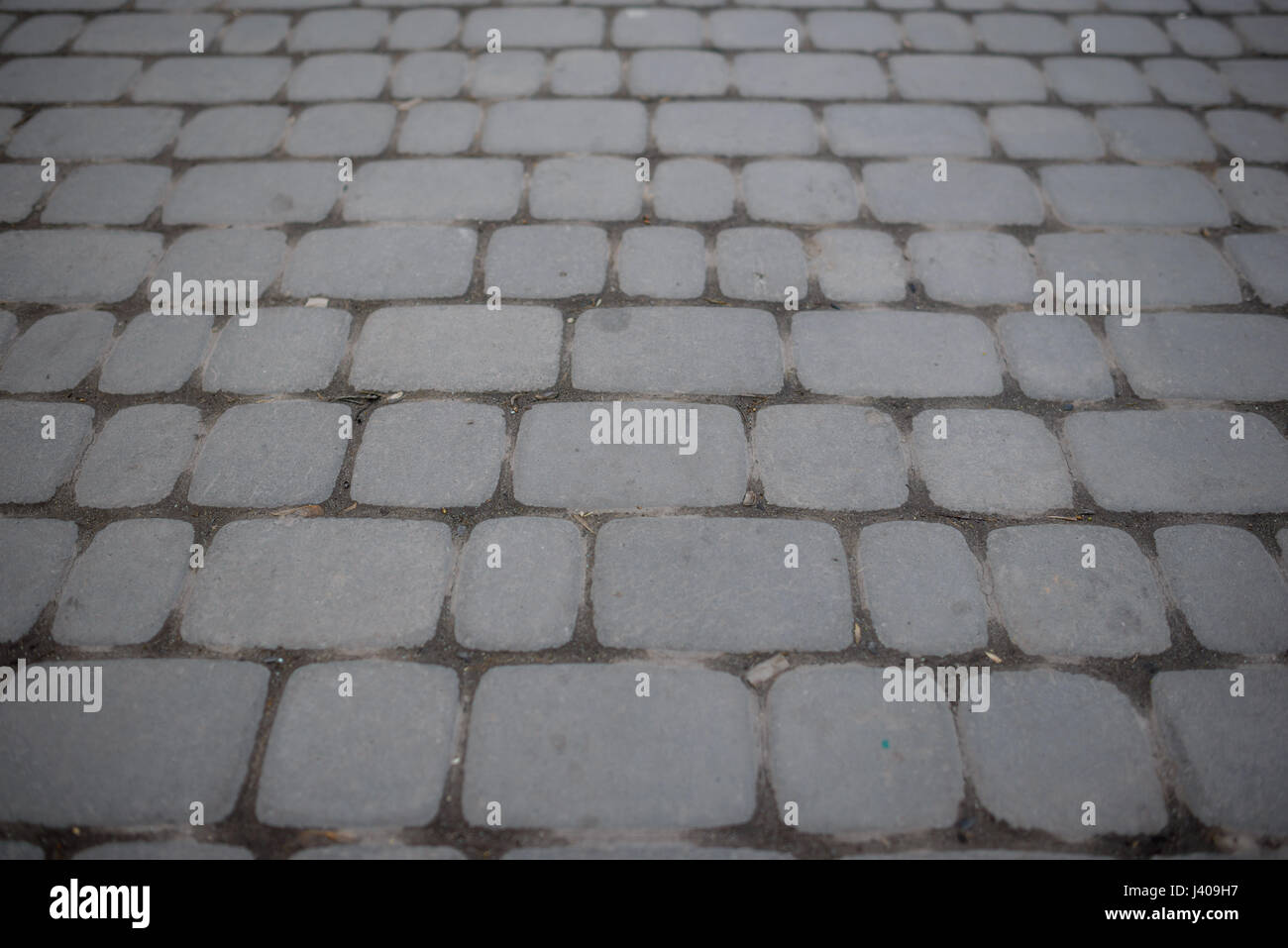 Perspective View of Monotone Gray Brick Stone Street Road. Sidewalk ...