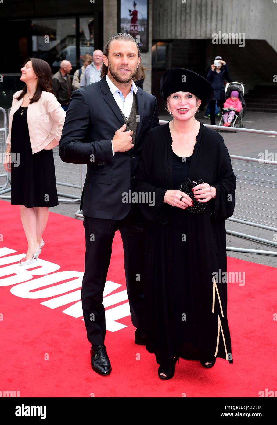 Luke J I Smith with his mother attending the UK Premiere of Jawbone at ...