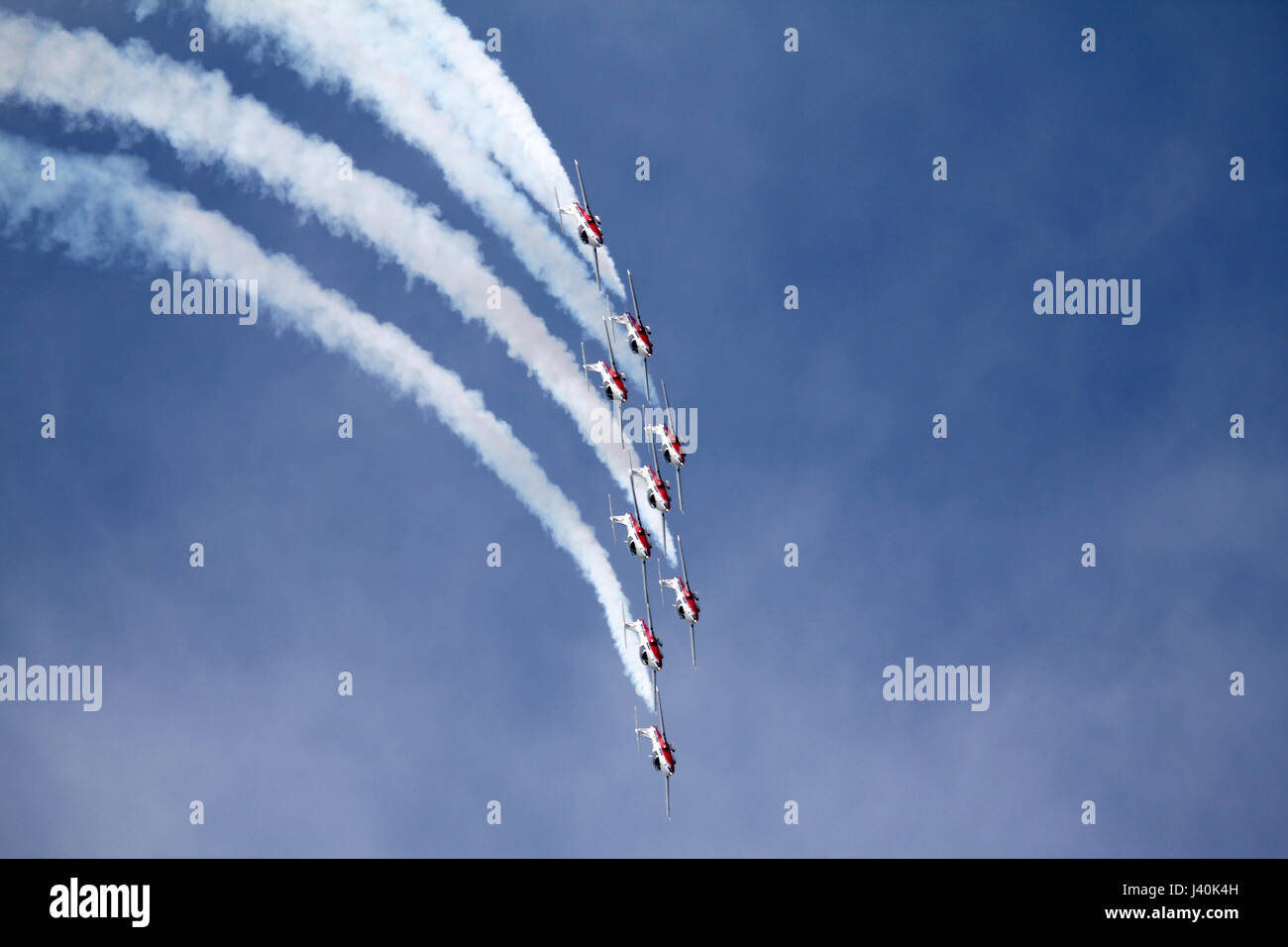 Canadian snowbirds changing direction and flying in formation towards ...
