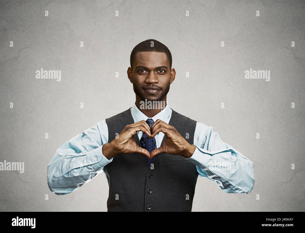 Positive african man makes hi-res stock photography and images - Alamy