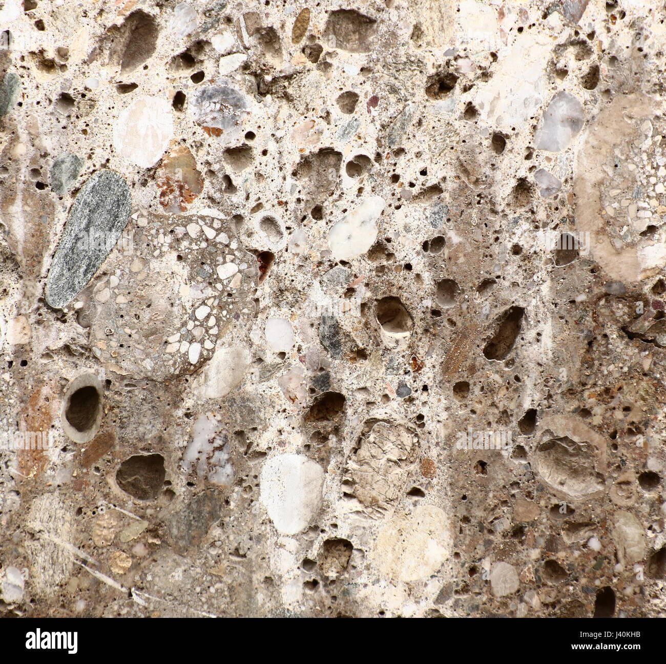 Building material structure with holes and rocks Stock Photo - Alamy