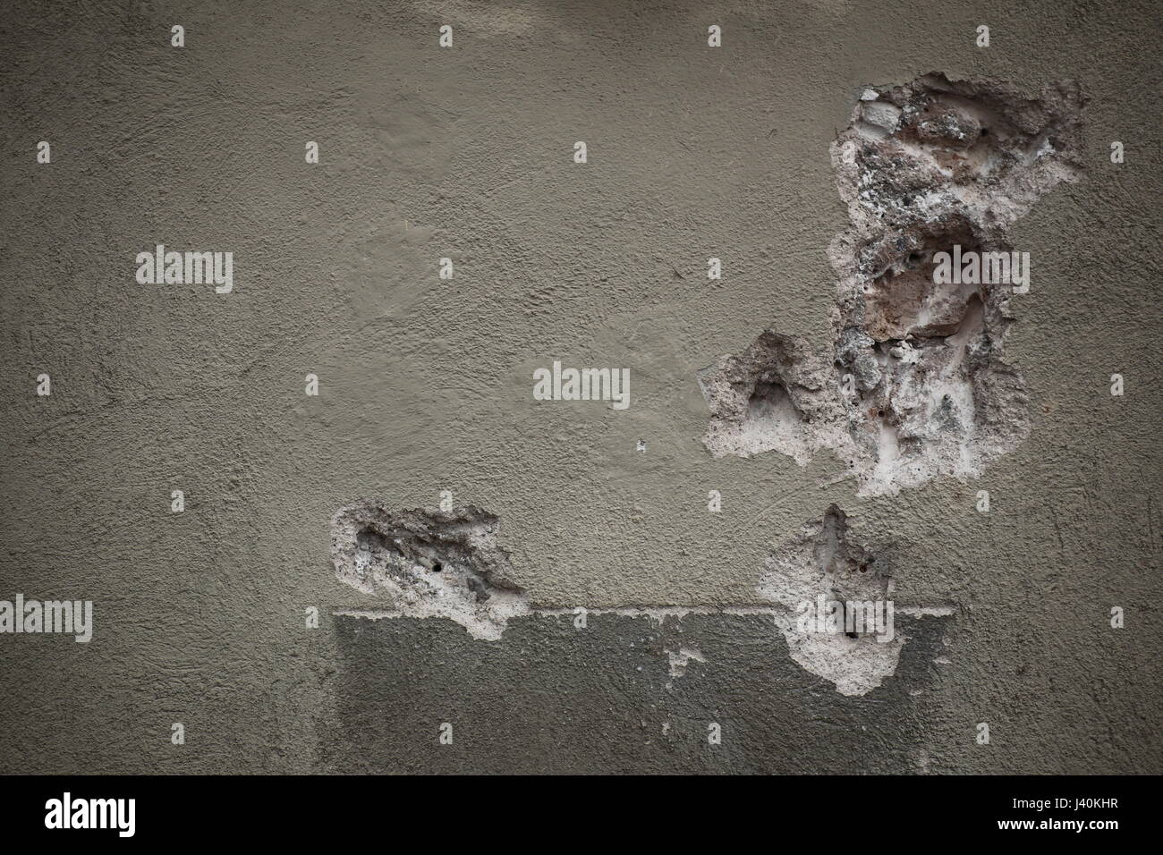 Damaged plaster on the wall of a building Stock Photo - Alamy