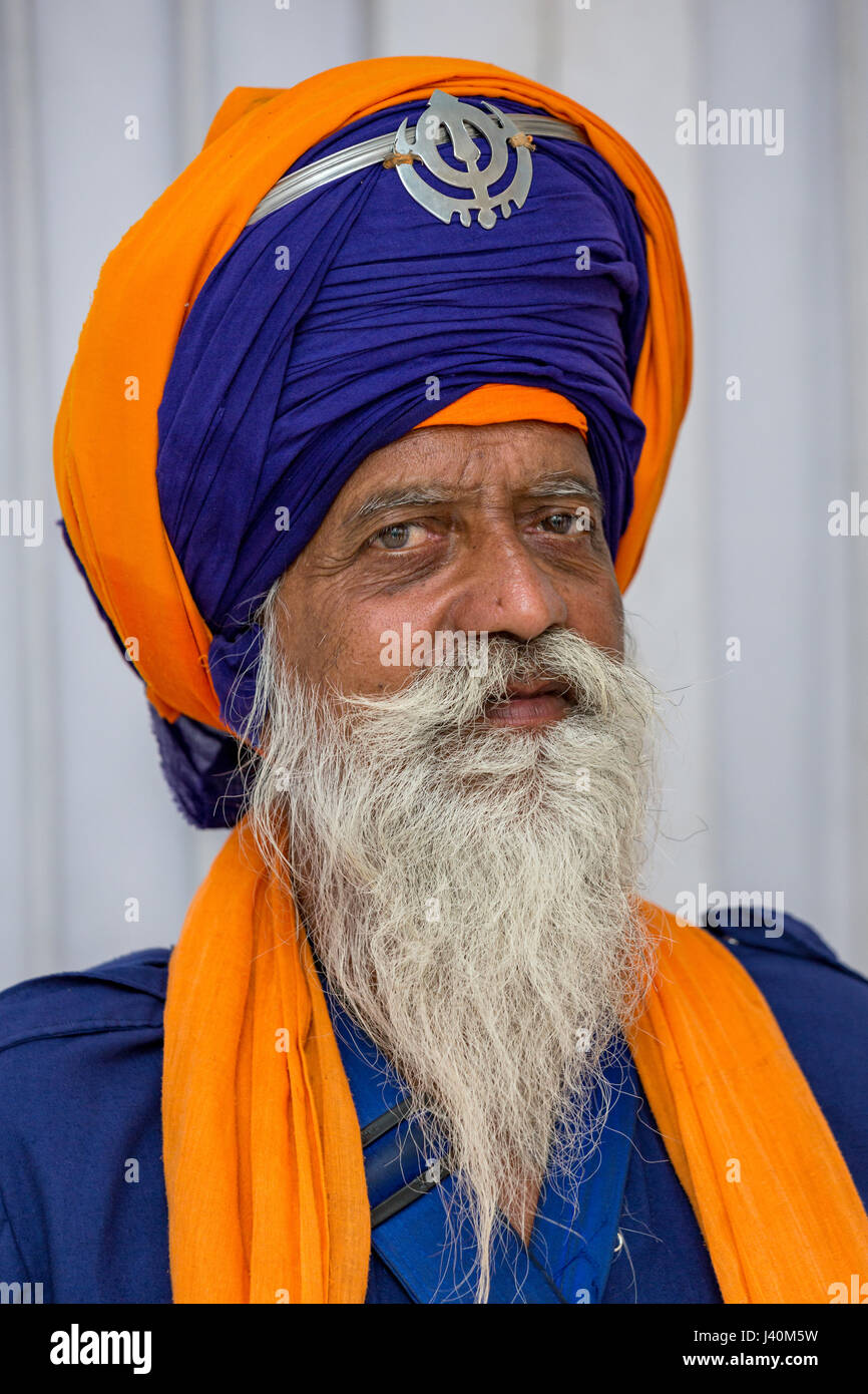 Sikh guard in The Golden Temple Complex in the Sikh city of Amritsar ...