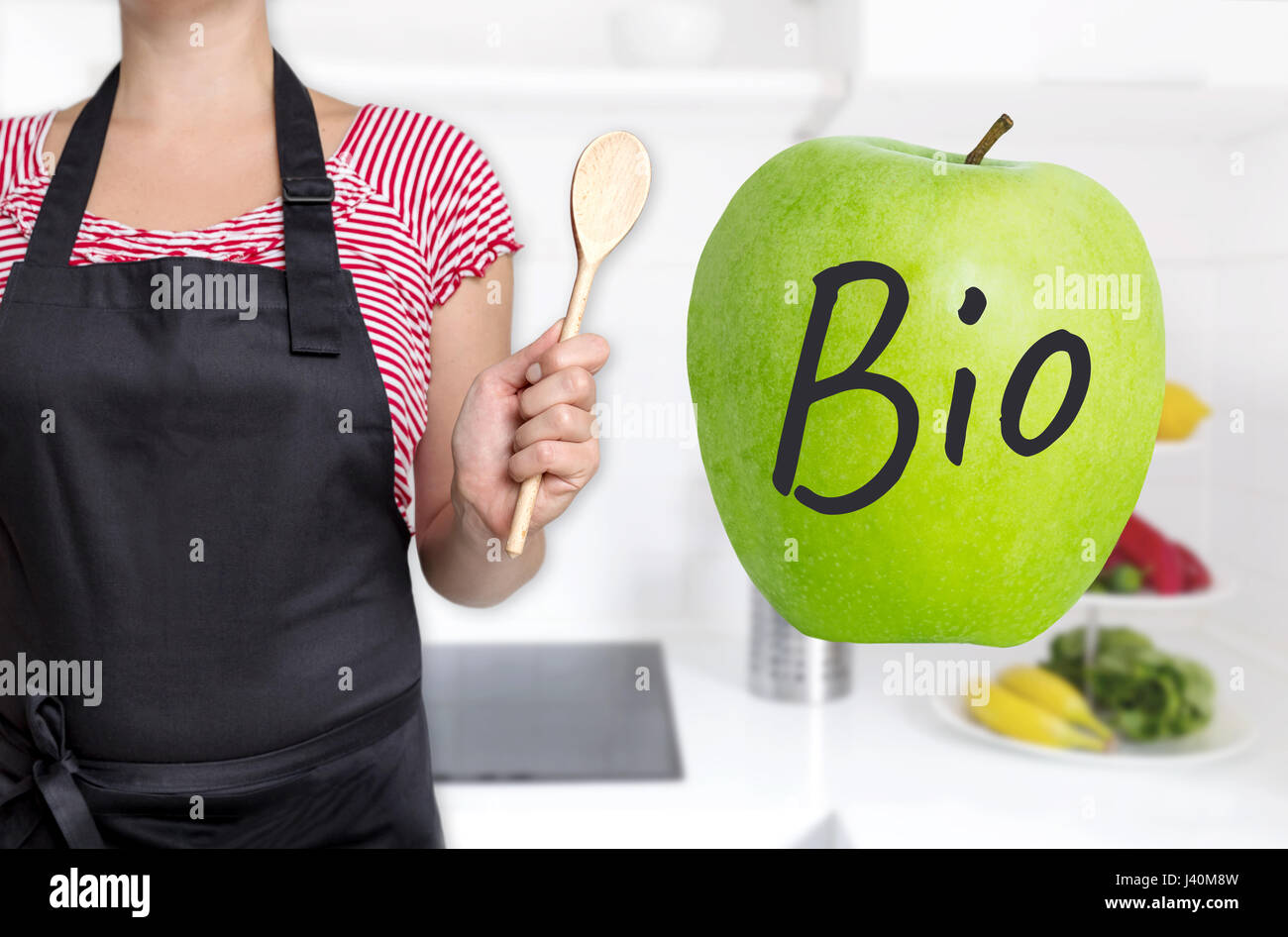 Bio Apple (in german Organic) concept is shown by chef Stock Photo - Alamy